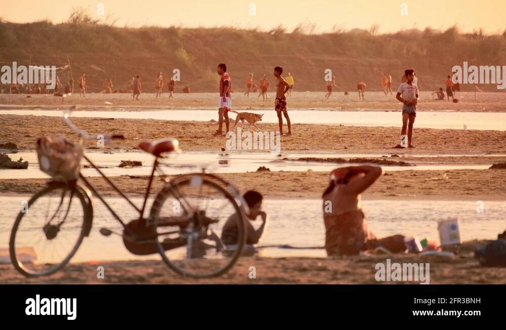 People washing clothes and bathing in Irrawaddy river. Myanmar Stock ...