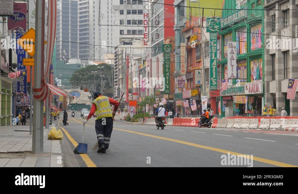 Man sweeping street Stock Videos & Footage - HD and 4K Video Clips - Alamy