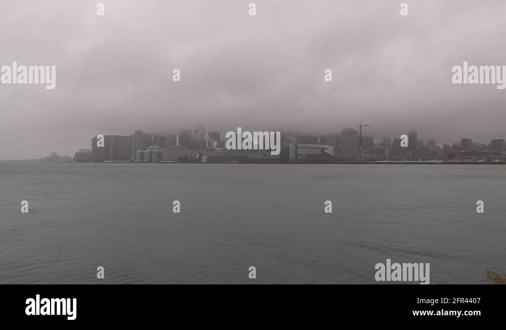 Low cloud and fog block out the CN tower and Toronto skyline Stock ...