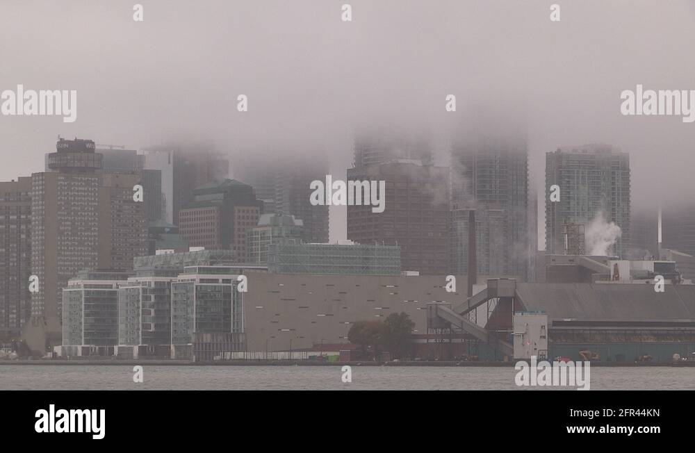 Low cloud and fog block out the CN tower and Toronto skyline Stock ...