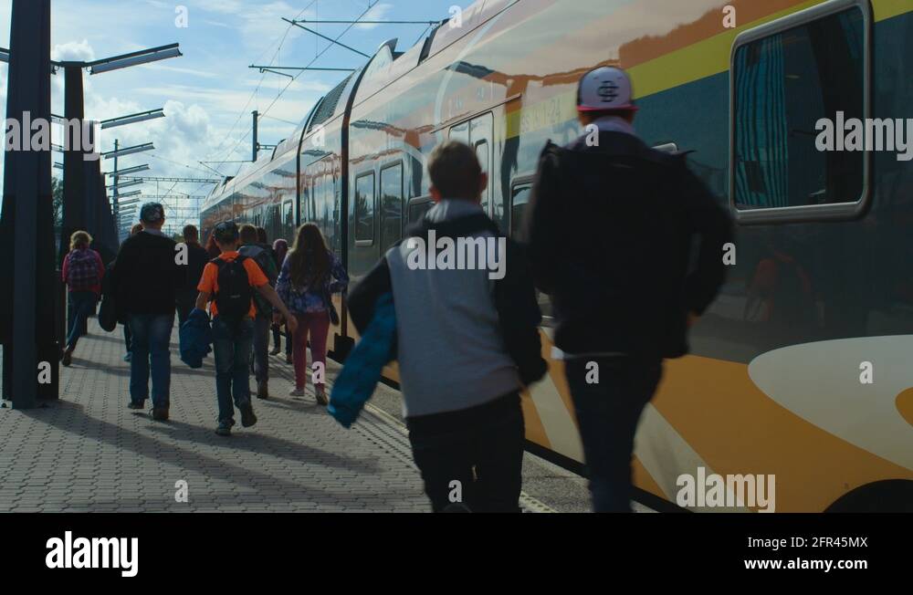 Group of Children with are Running towards Departing Train Stock Video ...