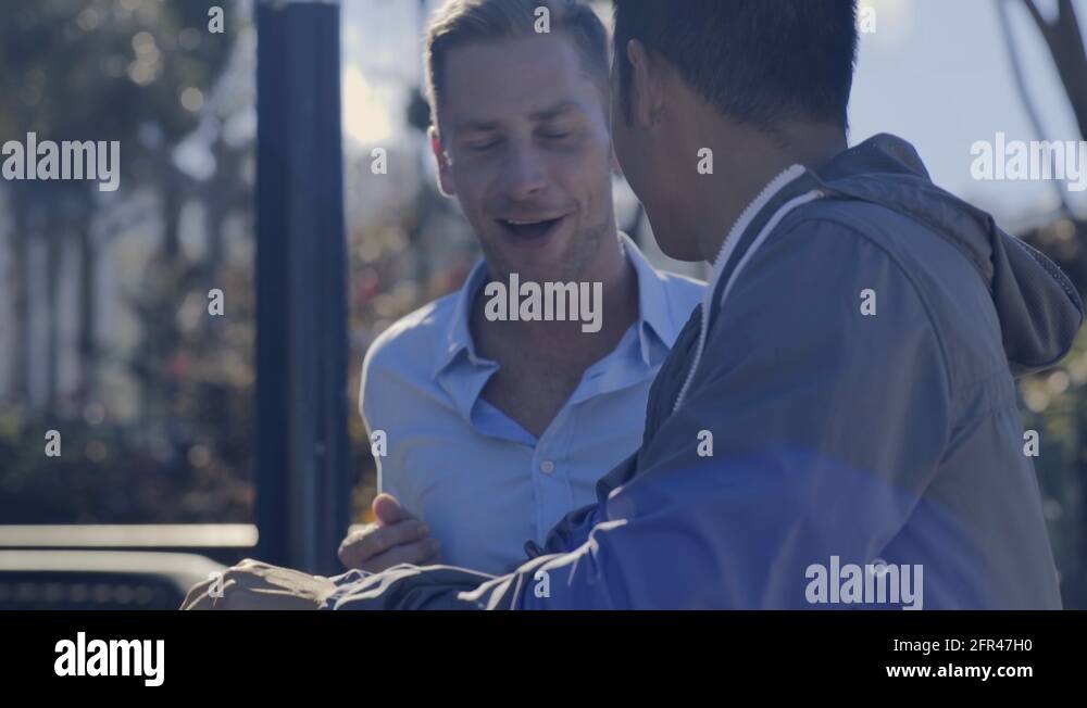 Gay Couple Flirt And Talk Then Kiss Stock Video Footage Alamy