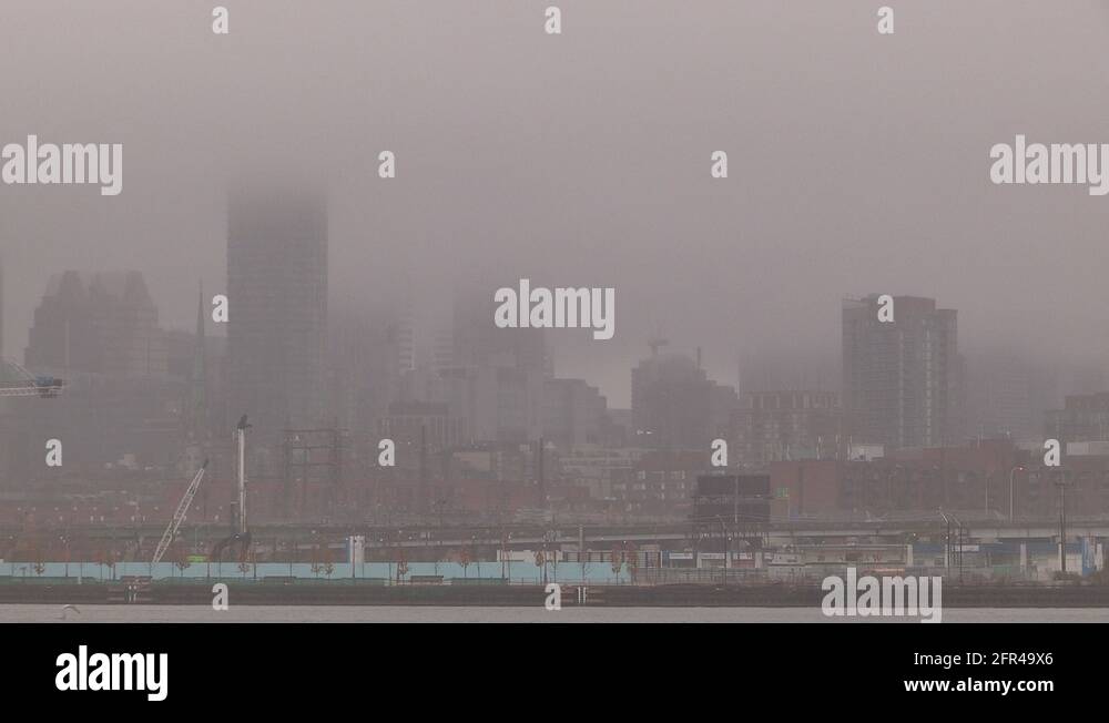 Low cloud and fog block out the CN tower and Toronto skyline Stock ...