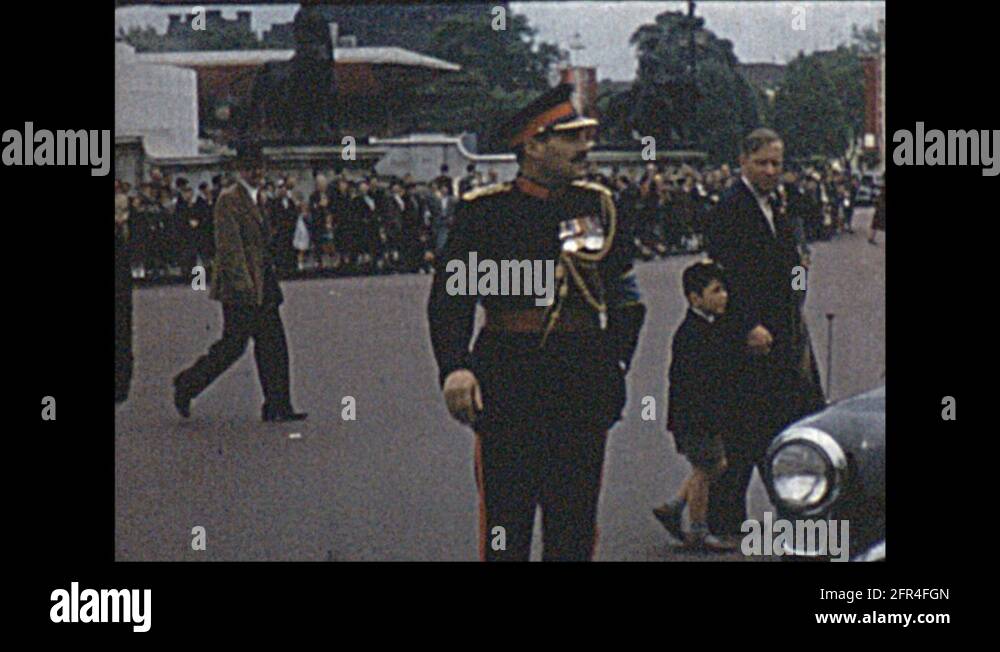 Vintage 16mm film, 1953, UK, coronation b-roll, dignitaries, the gates ...