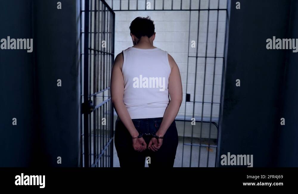 Jail cuffs Stock Videos & Footage - HD and 4K Video Clips - Alamy