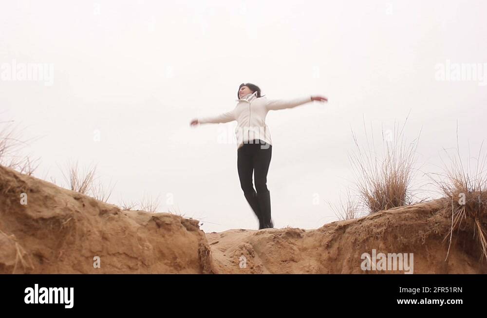 Young girl jumping in sand Stock Videos & Footage - HD and 4K Video ...