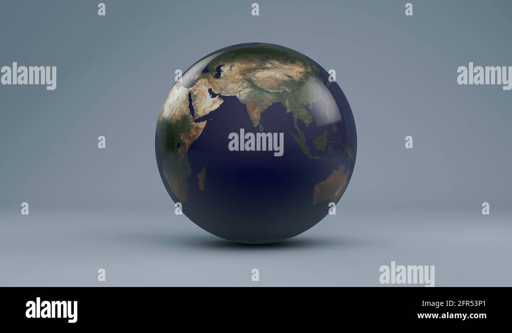 A glass orb planet Earth rotates on a pastel blue cyc - Earth 1012 HD ...