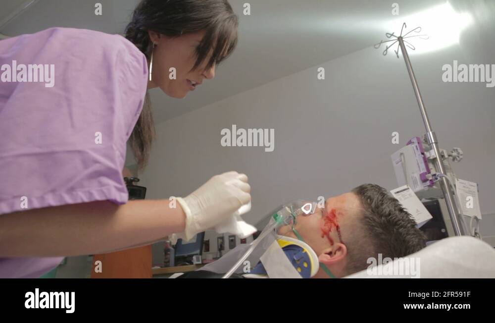 nurse female trauma emergency room accident male neck brace hospital ...