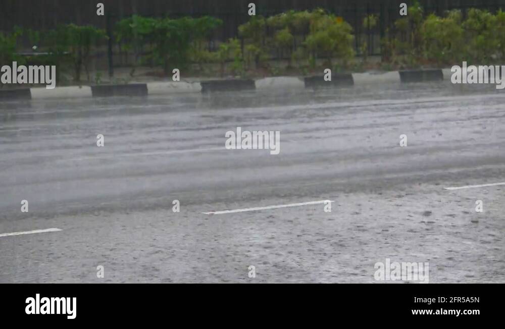 Heavy Monsoon Rains on a Busy Section of Highway in Southeast Asia ...