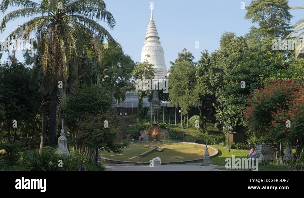 Park at Wat Phnom temple with giant grass clock,Phnom Penh,Cambodia ...