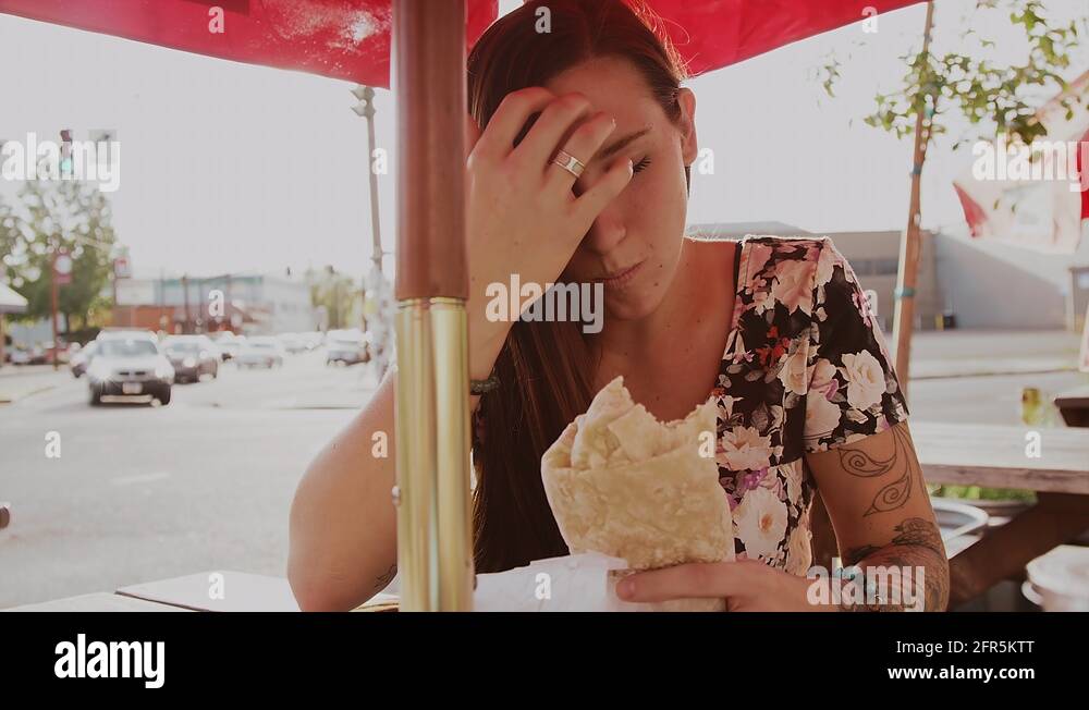 Eating a burrito Stock Videos & Footage - HD and 4K Video Clips - Alamy