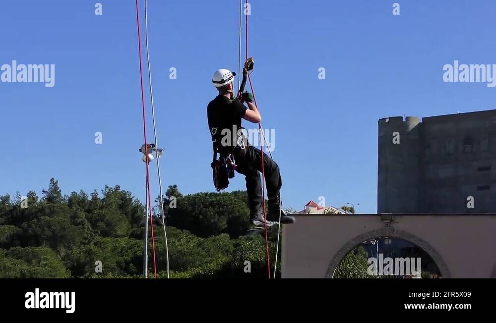 Firefighter from the Hadera Fire Brigade rope from crane Stock Video ...