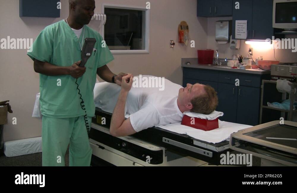 Man getting set up for radiation therapy treatments in hospital Stock ...