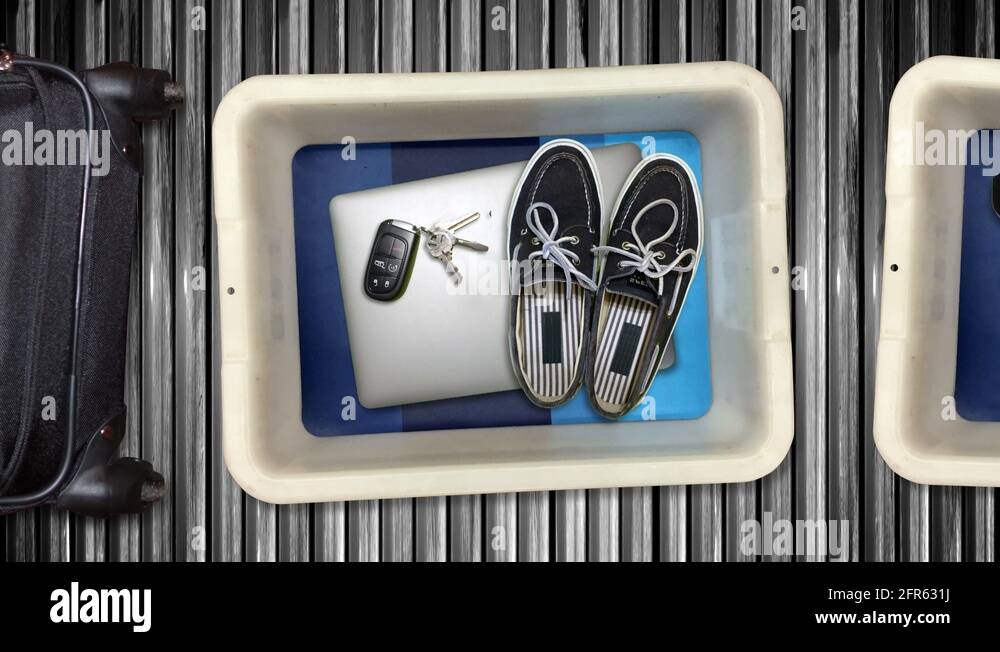 Passenger Items in TSA Airport X-Ray Bins Stock Video Footage - Alamy