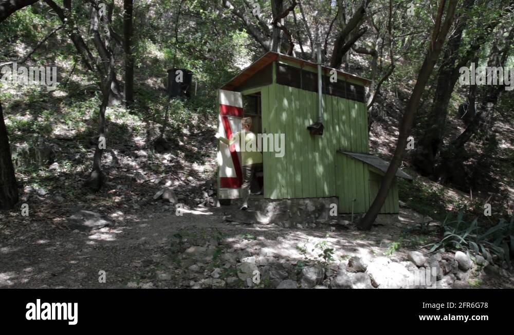Woman in outhouse Stock Videos & Footage - HD and 4K Video Clips - Alamy