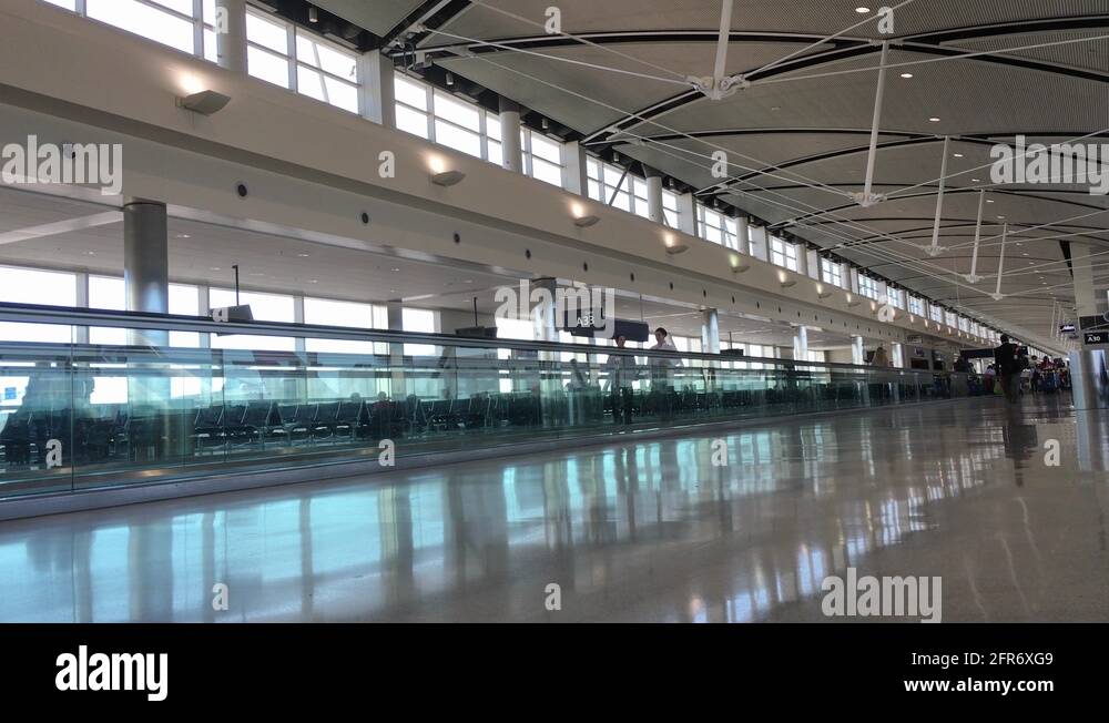 Travelers walking through Chicago airport terminal 4k Stock Video ...