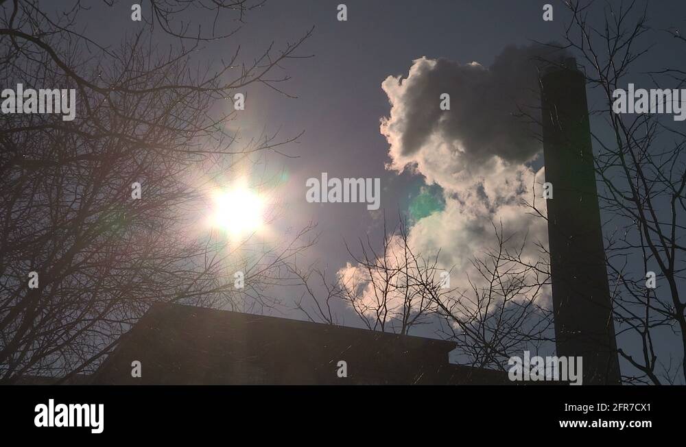 Smoke stacks from industry belching carbon and gases into the ...