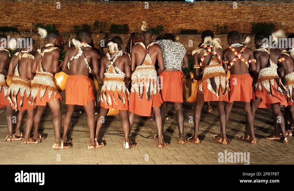 African tribe dancers, tribesmen tribeswomen dance sing songs drum jump ...