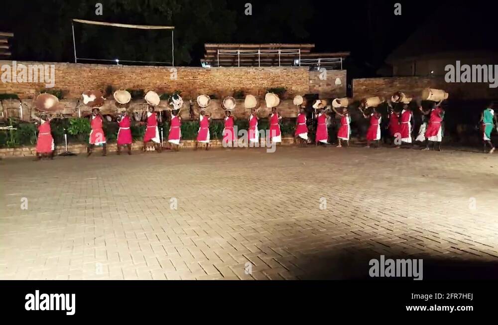 African tribe dancers, tribesmen tribeswomen dance sing songs drum jump ...