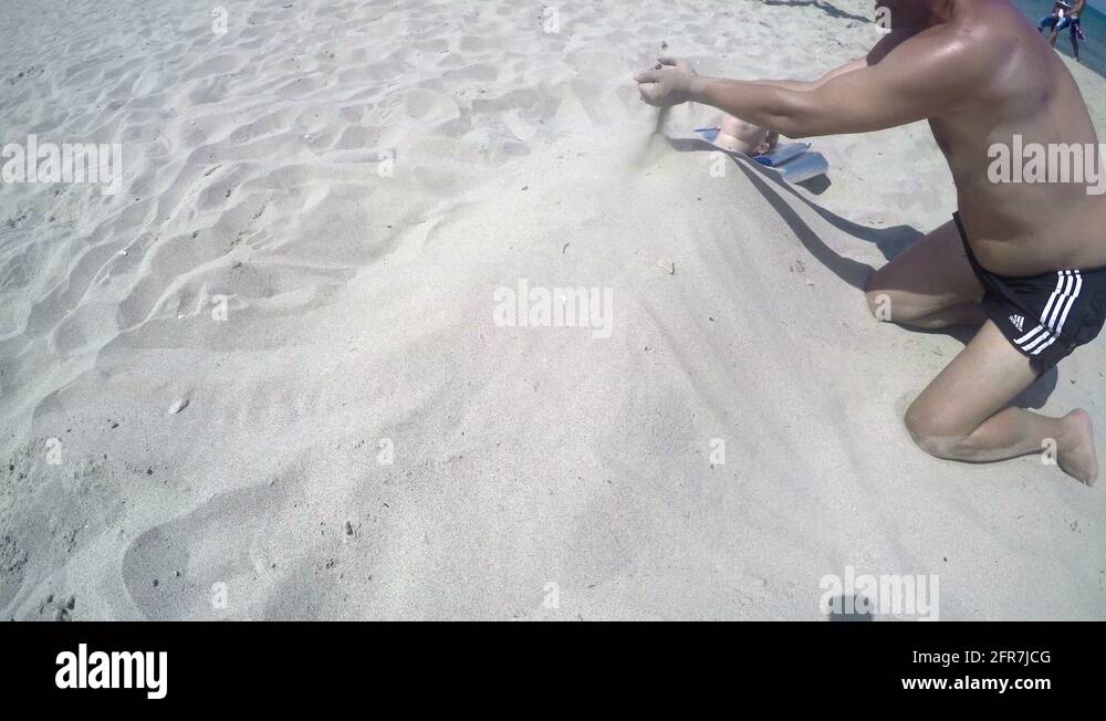 People digging in the sand Stock Videos & Footage - HD and 4K Video ...