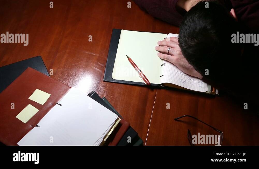 Man Sleeping on His Notes Stock Video Footage - Alamy