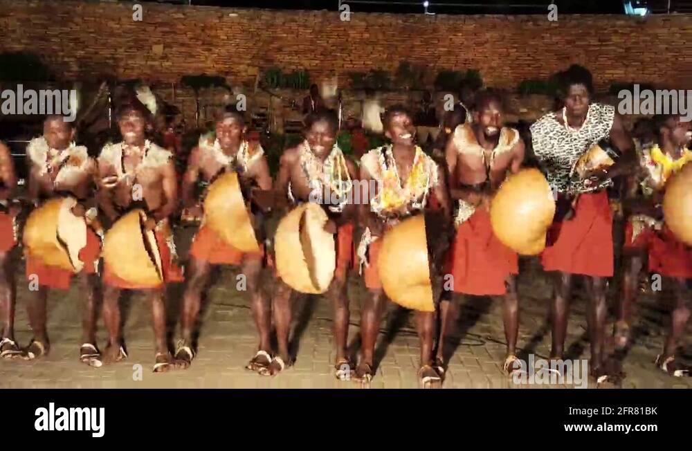 African tribe dancers, tribesmen tribeswomen dance sing songs drum jump ...
