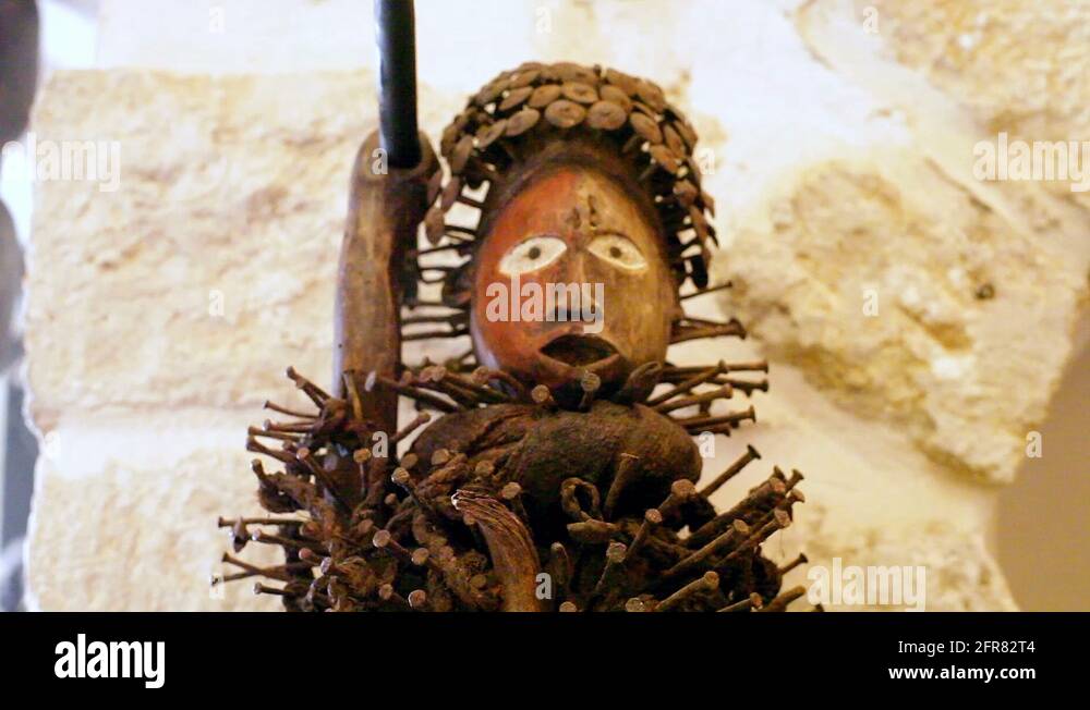 Scary African sculpture doll figure Stock Video Footage - Alamy