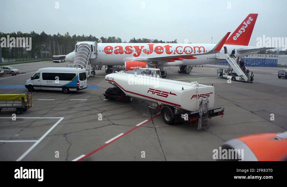 Easyjet airplane refuel, ground crew fueling truck, Berlin, Germany ...