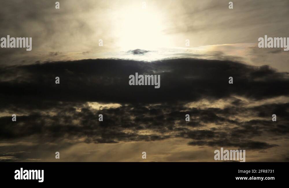 Dark cloud hiding sun Stock Videos & Footage - HD and 4K Video Clips ...