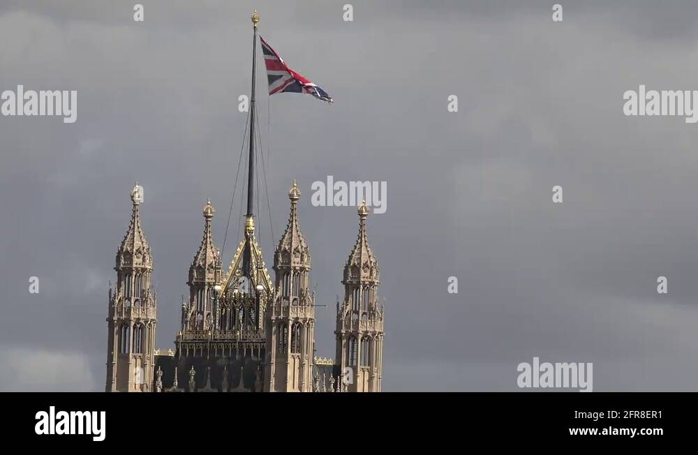4K Famous England flag wave Parliament tower London national symbol ...