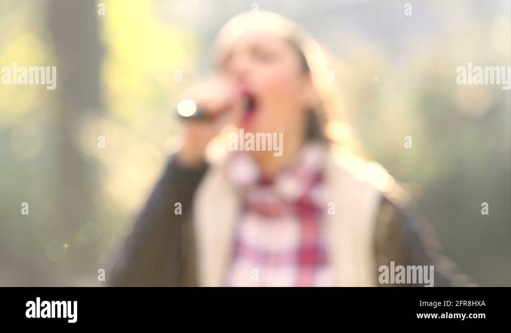 Beautiful woman singing microphone Stock Videos & Footage - HD and 4K Video Clips - Alamy