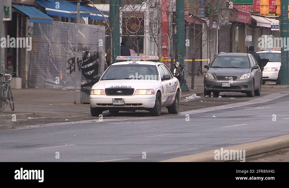 Police officers at shooting murder crime scene in Chinatown downtown ...