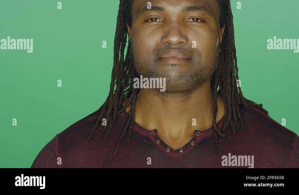 black man with dreads smiling, on a green screen background Stock Video ...