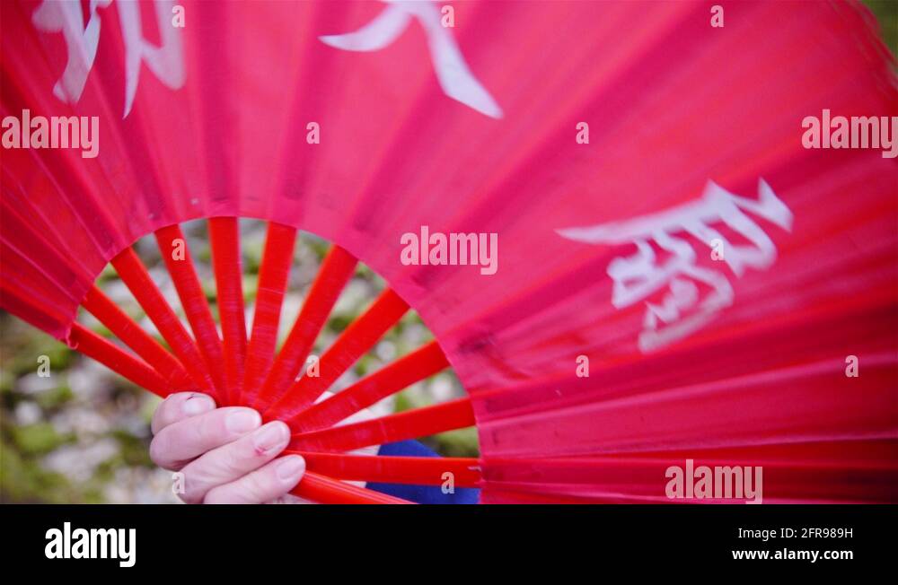 Red chinese fan Stock Videos & Footage - HD and 4K Video Clips - Alamy