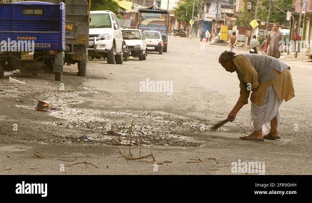 Man sweeping street india Stock Videos & Footage - HD and 4K Video ...