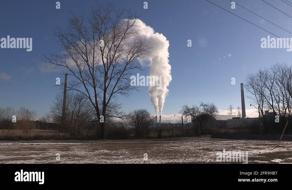 Smoke stacks from industry belching carbon and gases into the ...