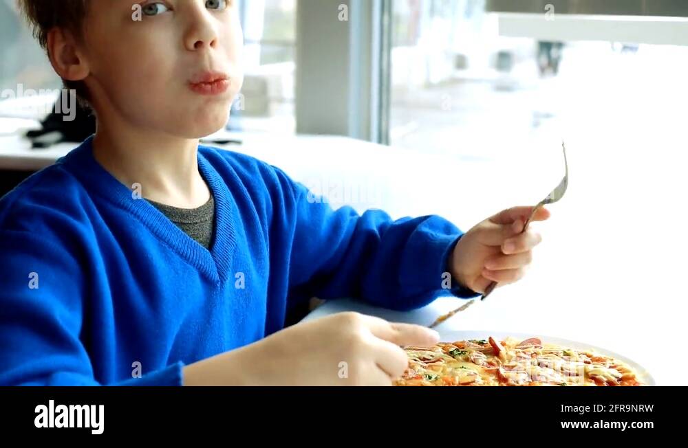 Man eating pizza with knife and fork Stock Videos & Footage - HD and 4K ...