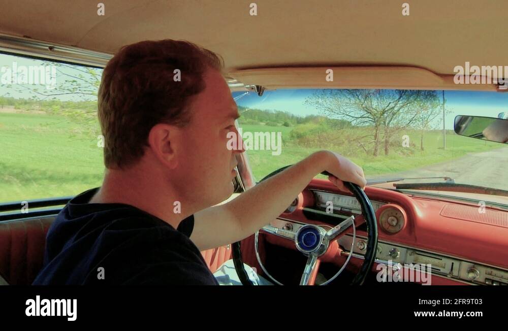 Man driving old car Stock Videos & Footage - HD and 4K Video Clips - Alamy
