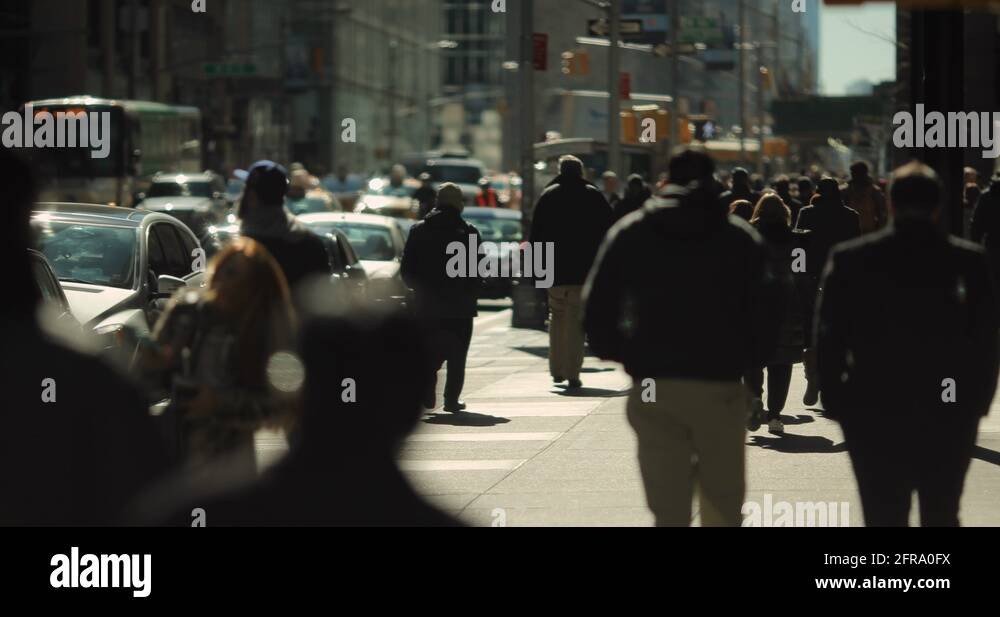Crowd of commuter people walking on street in New York City Stock Video ...