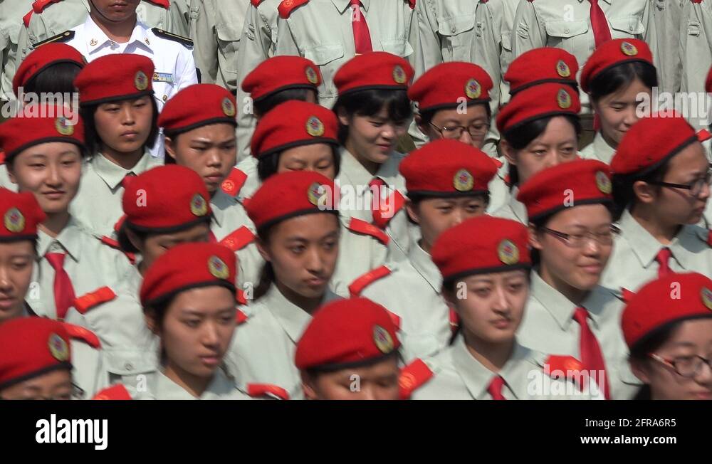 Female students wear army uniforms, red berets, military parade China ...