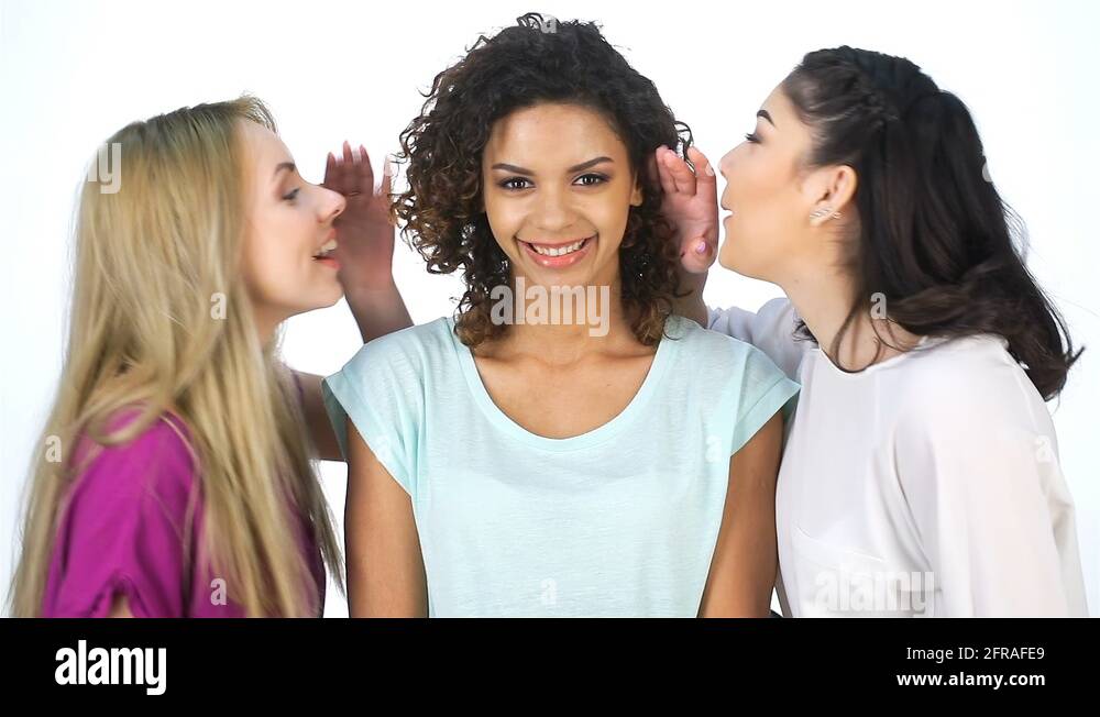 Whisper in friends ear Stock Videos & Footage - HD and 4K Video Clips ...