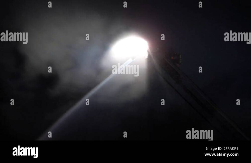 Firefighters On Ladder Truck With Heavy Smoke Stock Video Footage - Alamy