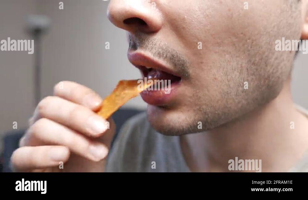 Man eating potato chips Stock Videos & Footage - HD and 4K Video Clips ...