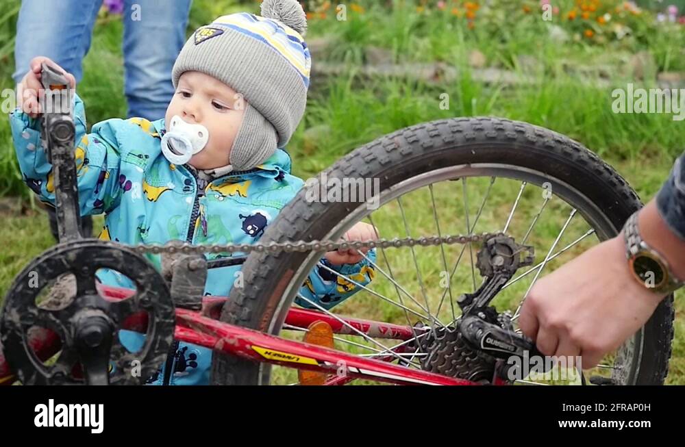Father and Son, 1 year old boy, are spending quality time together ...
