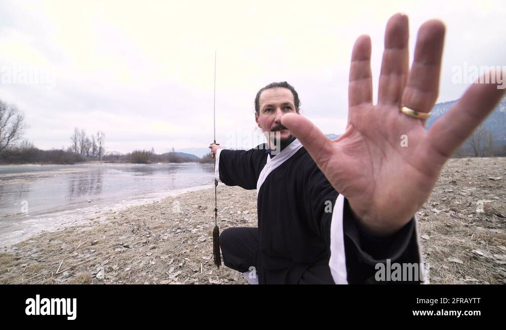 Martial arts sword fight shallow squat pose 4K Stock Video Footage - Alamy