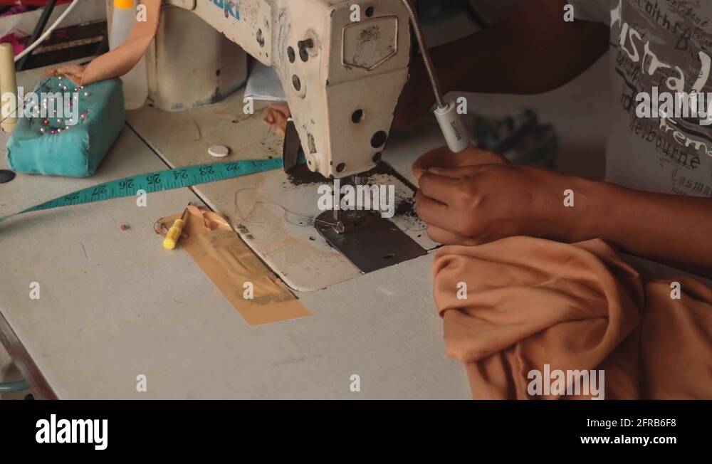 Man using sewing machine Stock Videos & Footage - HD and 4K Video Clips ...