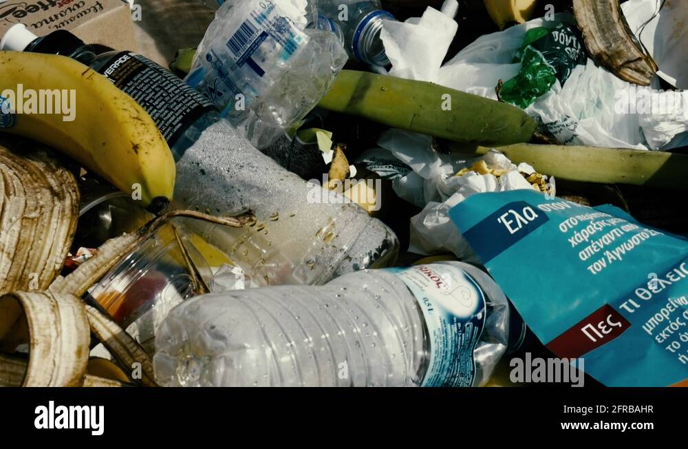 Pile of garbage laying around on public city street,Athens,Greece Stock ...
