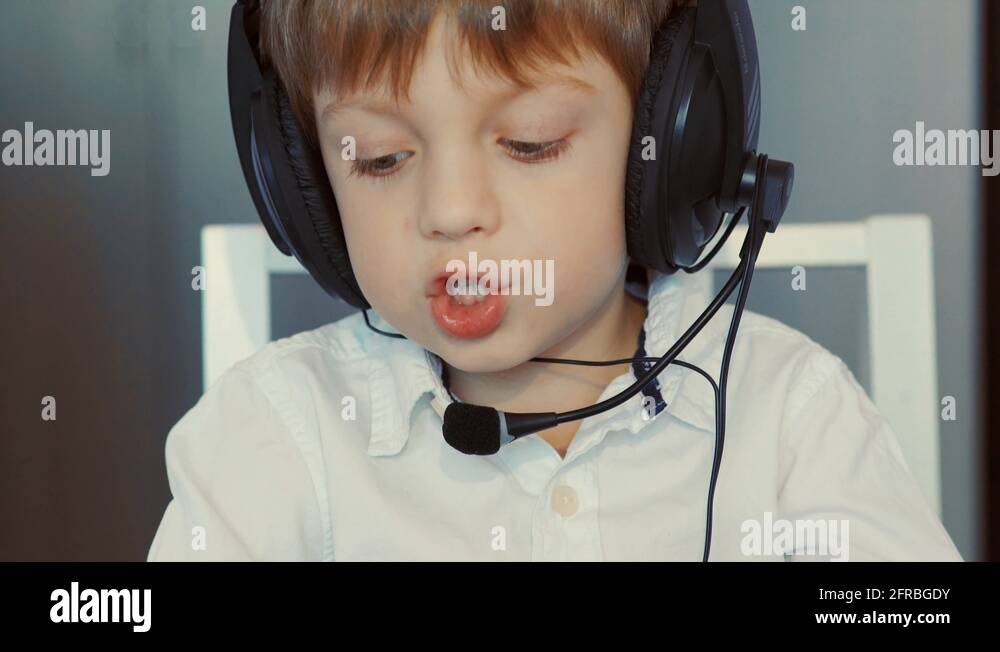 Boy with headset Stock Videos & Footage - HD and 4K Video Clips - Alamy