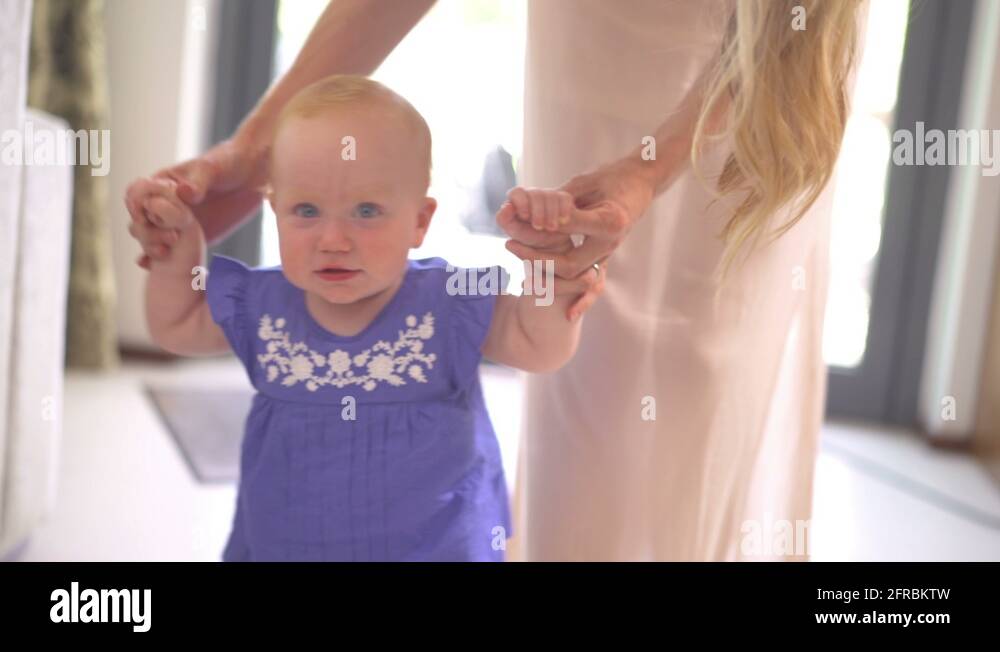 Baby taking its first steps Stock Videos & Footage - HD and 4K Video ...