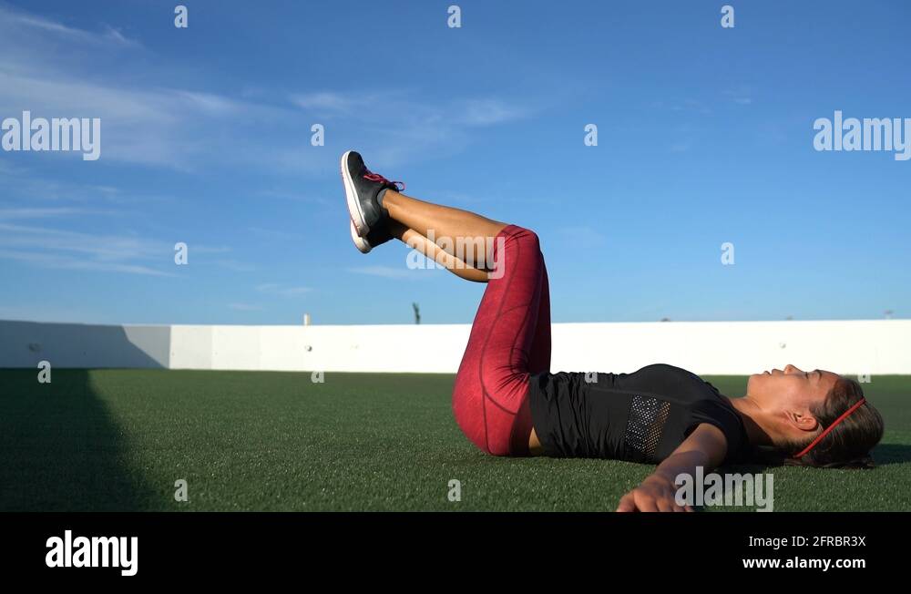 Knee leg drop exercise Ab workout fitness Asian woman training abs ...